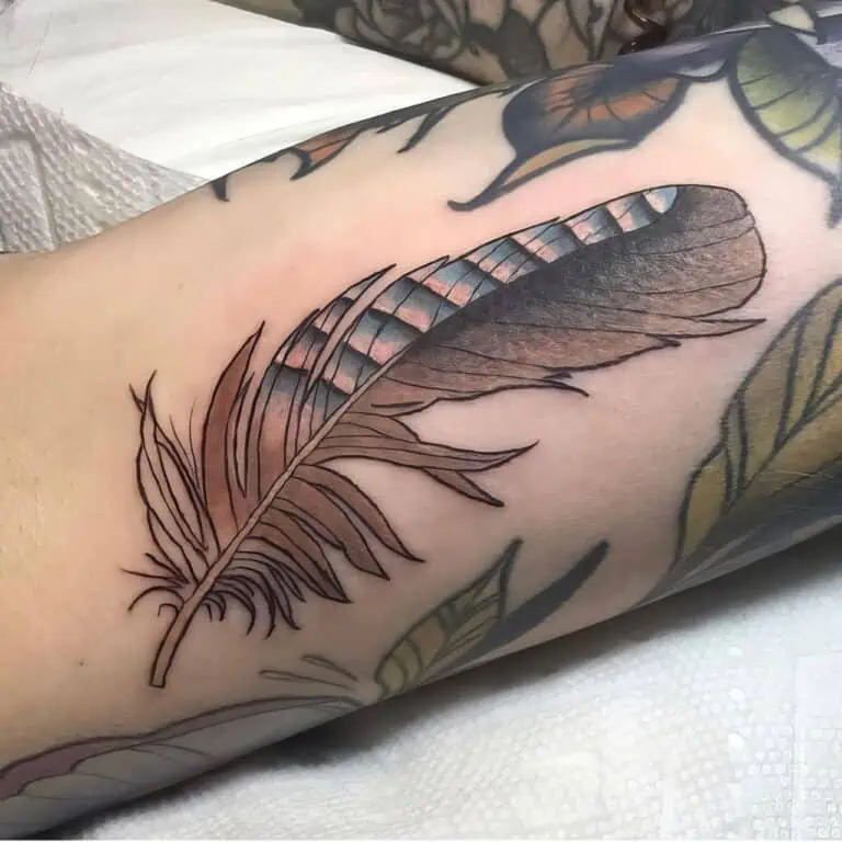 The Top 22 Feather Tattoo Designs For Men